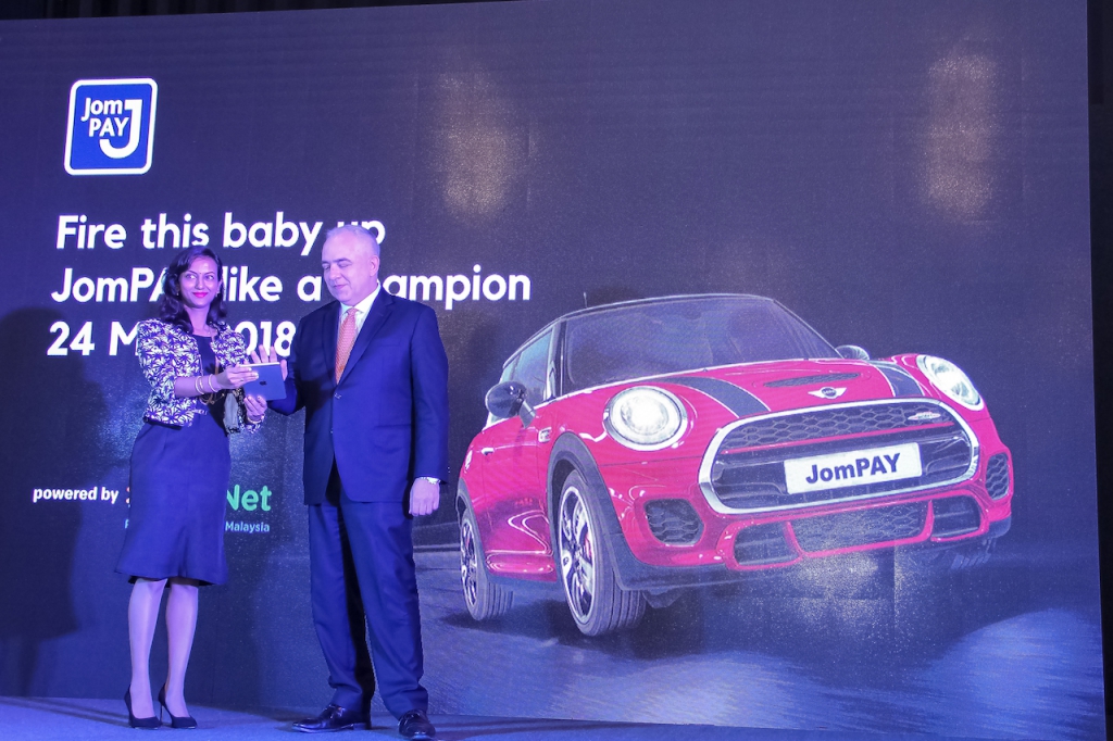 Mr Peter Schiesser, Group Chief Executive Officer of PayNet with the ...